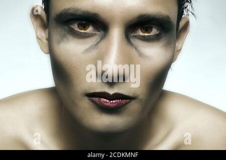 Indonesian young man made scary Stock Photo - Alamy