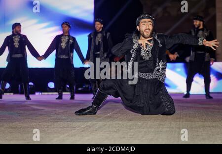 Traditional Jordanian folklore dance (Dabke) in Katara cultural village ...