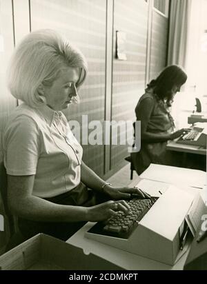 Data input, punching machines punch punch cards on which the commands ...