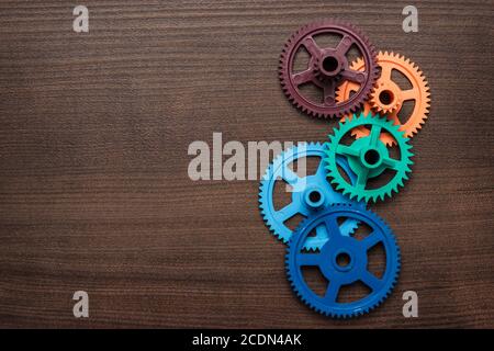 Wooden gears on yellow background with space for text, top view Stock ...