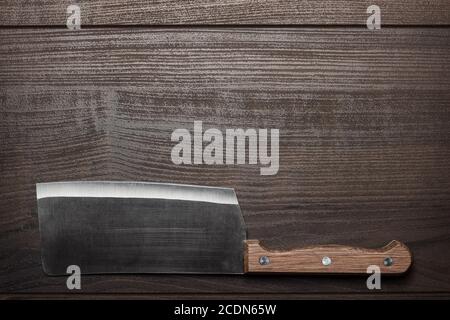 kitchen knife on brown wooden table Stock Photo - Alamy