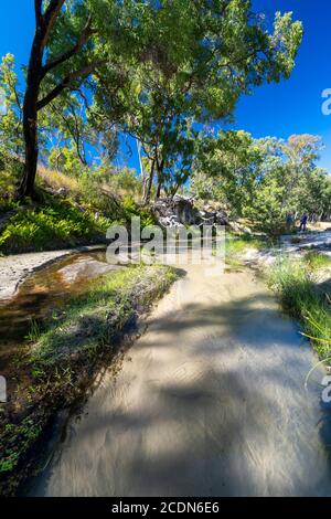 Sandy riverbed with clear water of Nogoa River near junction with ...