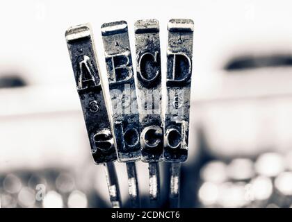 ABCD with old typewriter hammers in monochrome Stock Photo - Alamy