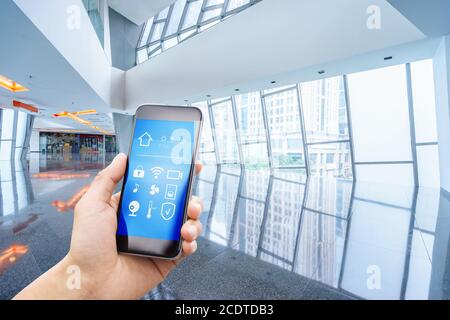 smart phone with smart home with modern corridor Stock Photo - Alamy