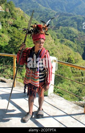 Senior Ifugao man in traditional costume. Banaue Rice Terraces in the ...