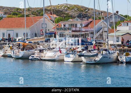 Boats in the harbor of Grundsund on the Swedish west coast Stock Photo ...
