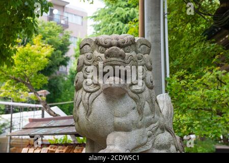 Japanese stone lion statue in Nanba Yasaka Shrine Stock Photo - Alamy