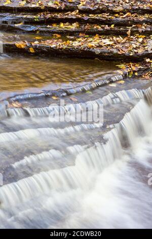 Water flowing over shale stone Stock Photo - Alamy