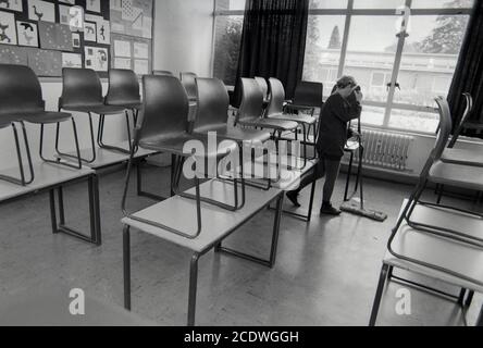 Cleaners at work at Addington High School, New Addington near Croydon ...