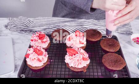 Step by step. Piping Italian buttercream frosting on top of mini ...