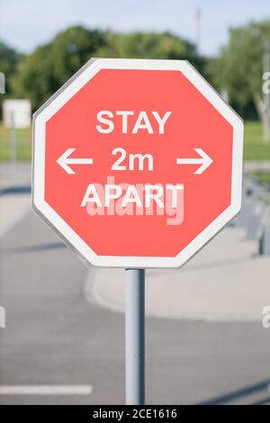 stay two meters apart outdoor sign Stock Photo - Alamy