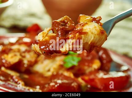 Merluzzo Mediterranea alla Siciliana Stock Photo - Alamy