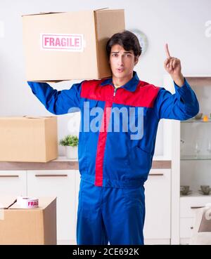 The transportation contractor with fragile boxes Stock Photo - Alamy