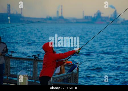 People fishing in the port of Yokohama Stock Photo - Alamy
