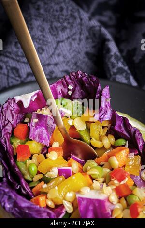 From above of ceramic plates near glasses of red wine and cutlery on ...