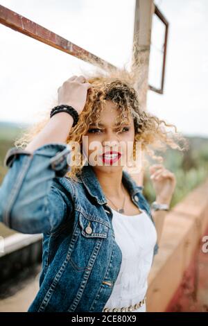 Fashionable african american woman, wear hand made face mask posing ...