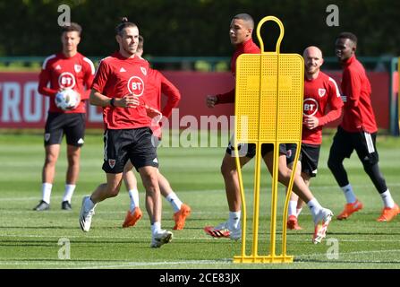 Wales' Gareth Bale (left) during a training session at The Vale Resort ...