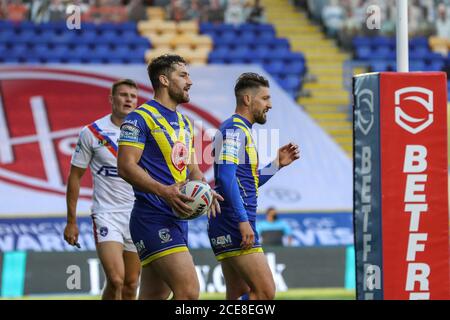 Warrington Wolves' Toby King scores their side's first try of the game ...