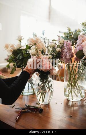 Beautiful female florist Stock Photo - Alamy