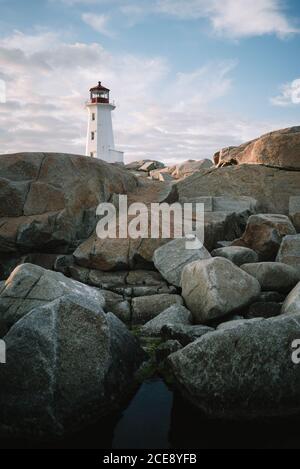 Lighthouse against cloudy sky at dusk, elevated view Stock Photo - Alamy