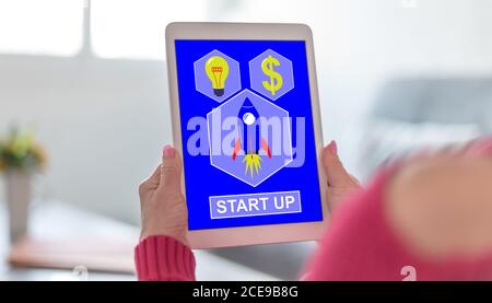 Tablet screen displaying a start up concept Stock Photo - Alamy