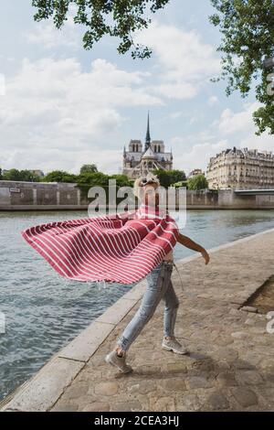 side view of a man standing waving on white background Stock Photo - Alamy