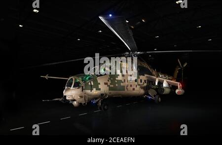Mil Mi-35P, Mi-24P Variant 2019 - Phoenix, modern attack helicopter in the dark, lit by ...