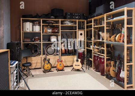 Shelves with musical instruments Stock Photo - Alamy