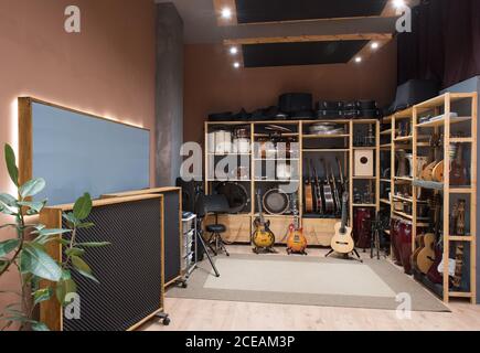 Shelves with musical instruments Stock Photo - Alamy