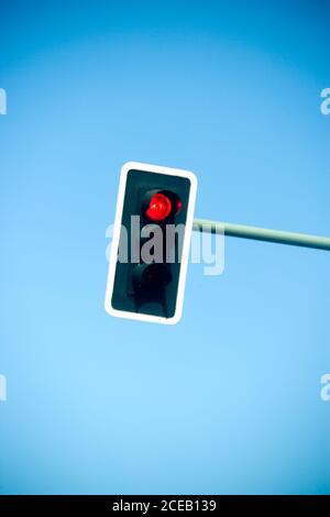 Traffic light with a burning red signal. Traffic light with a burning ...