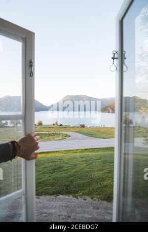 Beautiful view of mountain landscape through window Stock Photo - Alamy