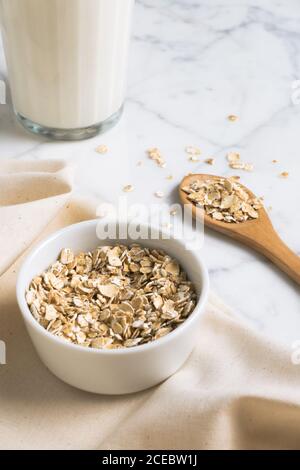 oat milk in glass on wood background with copy space, wide photo Stock ...