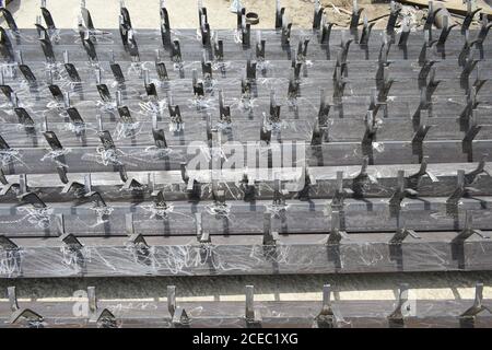 Steel angles with hundreds of support cleat Stock Photo - Alamy