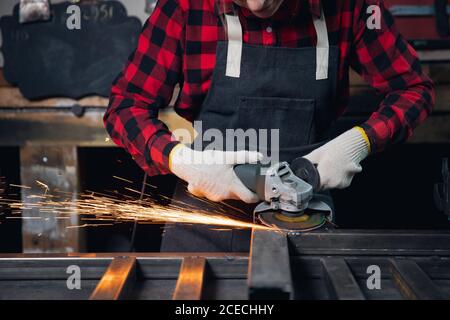 girl with hand saw Stock Photo - Alamy