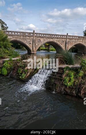 A small weir at Bathampton on Avon, a few miles from Bath in Britain ...