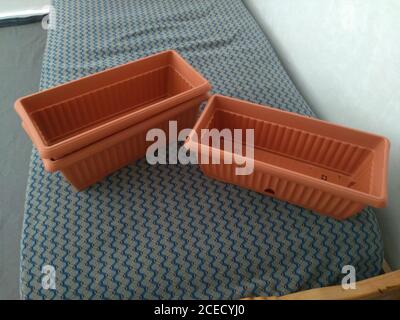 top view on flower pot and hyacinth on a gardening table Stock Photo ...