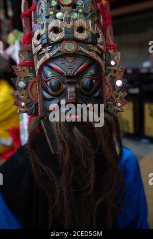 Miao person wearing traditional mask Stock Photo - Alamy