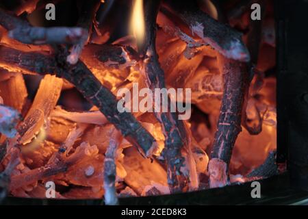 Incandescent wood pieces and flame Stock Photo - Alamy