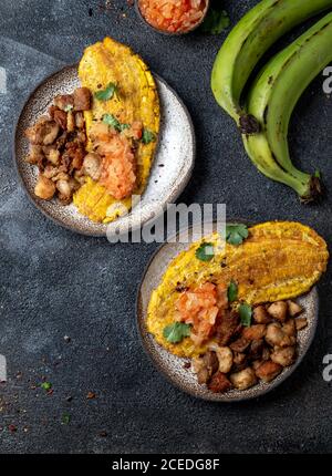 Top view of typical Latin American food. Group of arepas and different ...