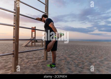 Male legs. Side view of the muscular legs of an athletic, physically ...