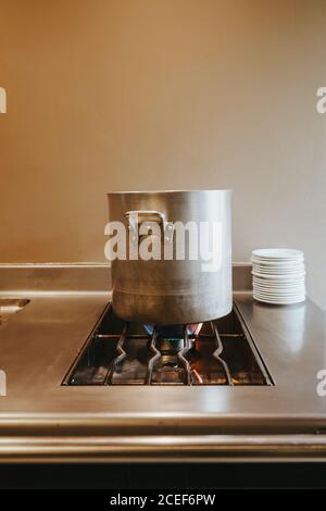 Professional gas stove in kitchen Stock Photo - Alamy
