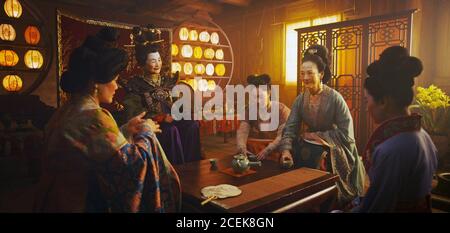 MULAN, from left: LIU Yifei as Mulan, AN Yoson, Donnie YEN, 2020. ph ...