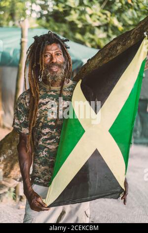 unshaven guy in white shirt showing thumb up . unshaven guy style ...