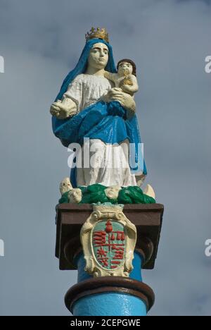 A closeup of a statue of Baby Jesus on a cloth - baby from The Nativity ...