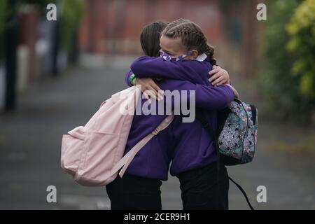 RETRANSMITTING AMENDING BYLINE Kadie Lane (right), 11, and Brooke ...