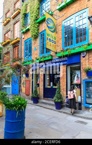 People in Neil's Yard, outdoor cafes and pop ups in trendy urban health ...