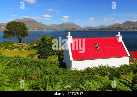 Cottage with Red Roof, Shieldaig, Scotland Stock Photo - Alamy