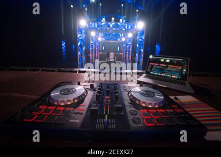 DJ mixing console. Tune in before a concert Stock Photo - Alamy