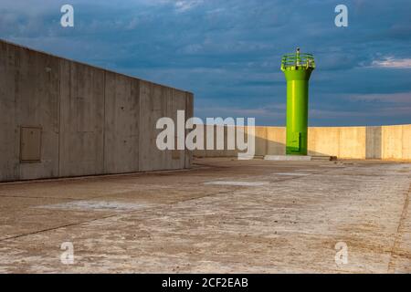 beacon in a seaport at the entrance to the port Stock Photo - Alamy