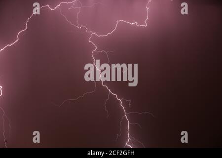 Lightning storm linear shape night Stock Photo - Alamy